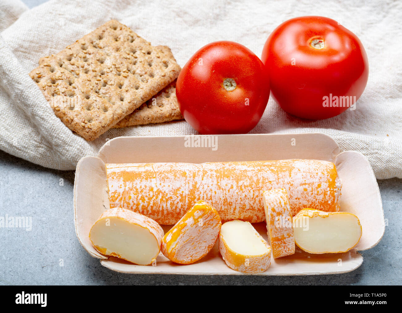 Fagotin cheese with orange coloured rind made from cow milk in caves of ...