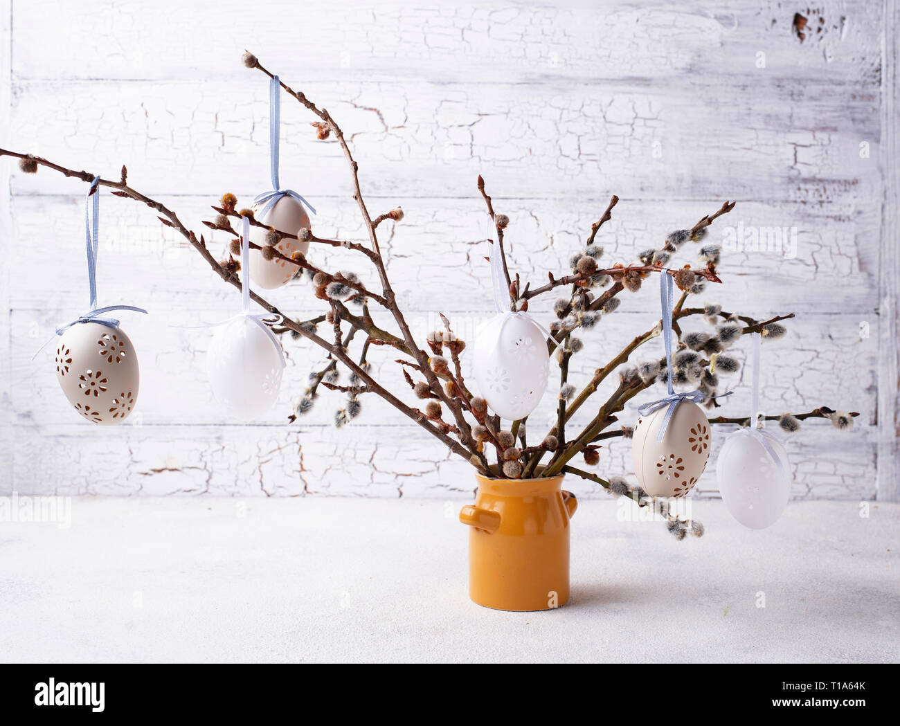 Easter background with willow and eggs Stock Photo - Alamy