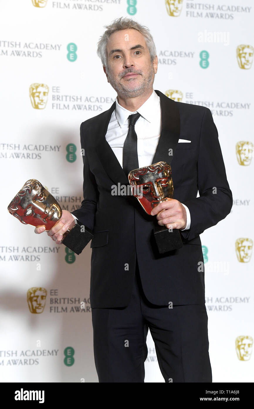 Alfonso Cuaron poses in the press room at the EE British Academy Film ...