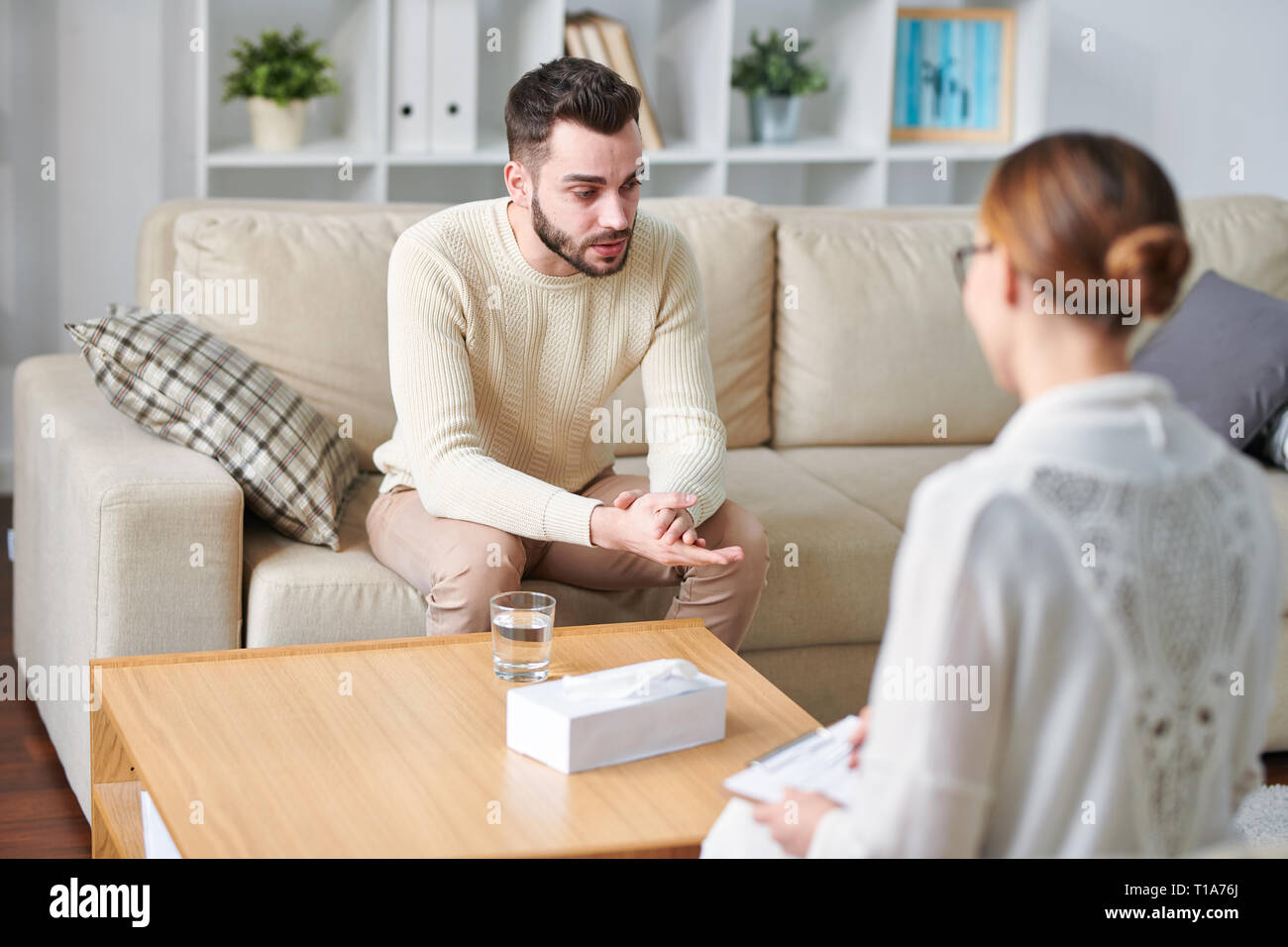 Patient of counselor Stock Photo - Alamy