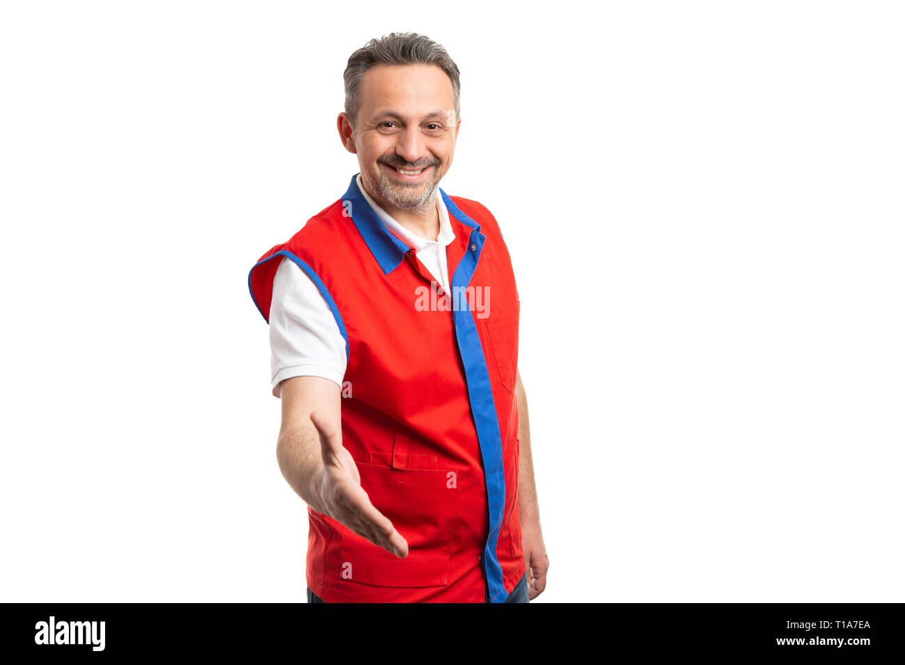 Friendly supermarket or hypermarket male employee smiling as waiting ...