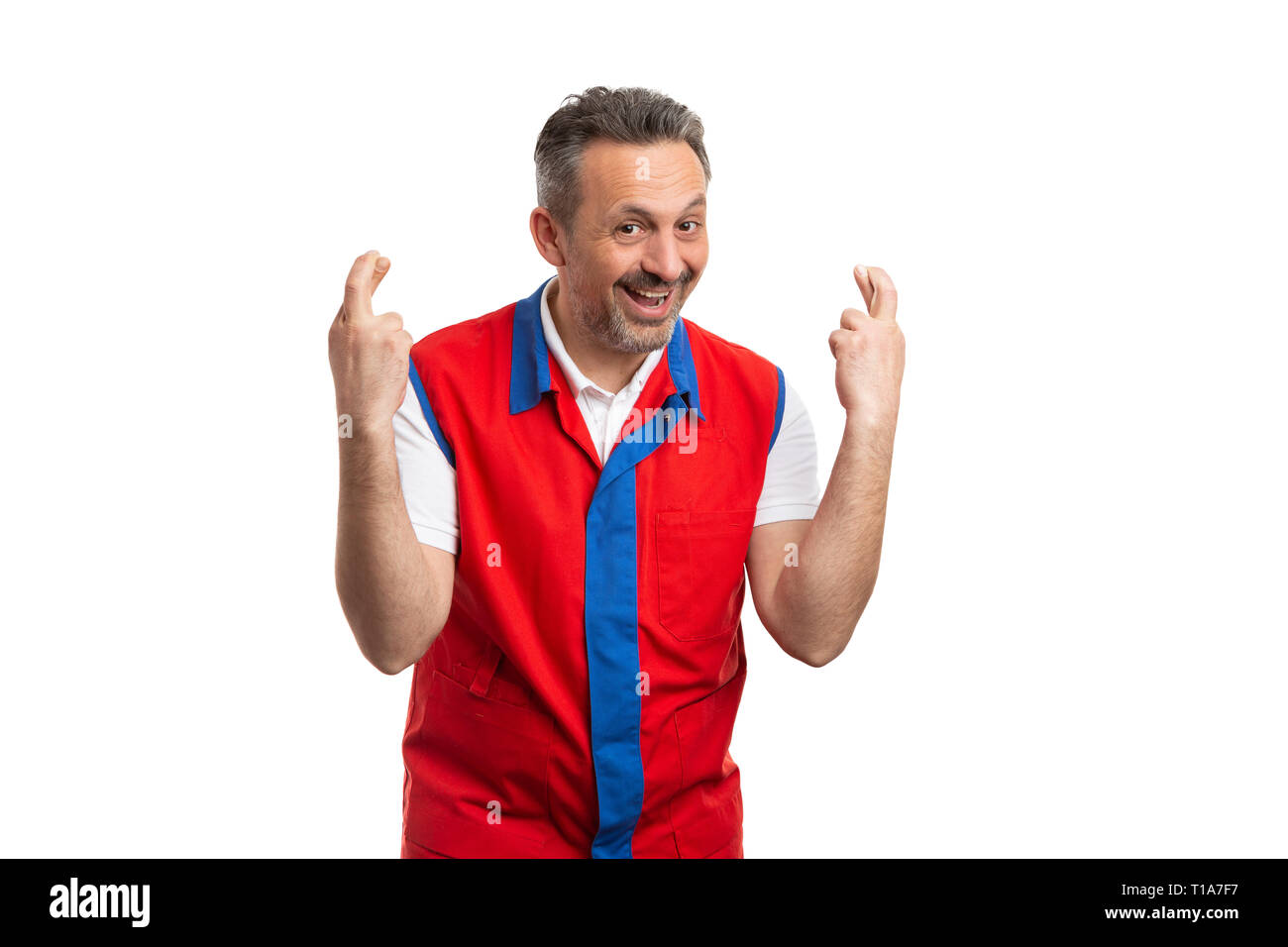 Friendly male hypermarket or supermarket employee making good luck ...
