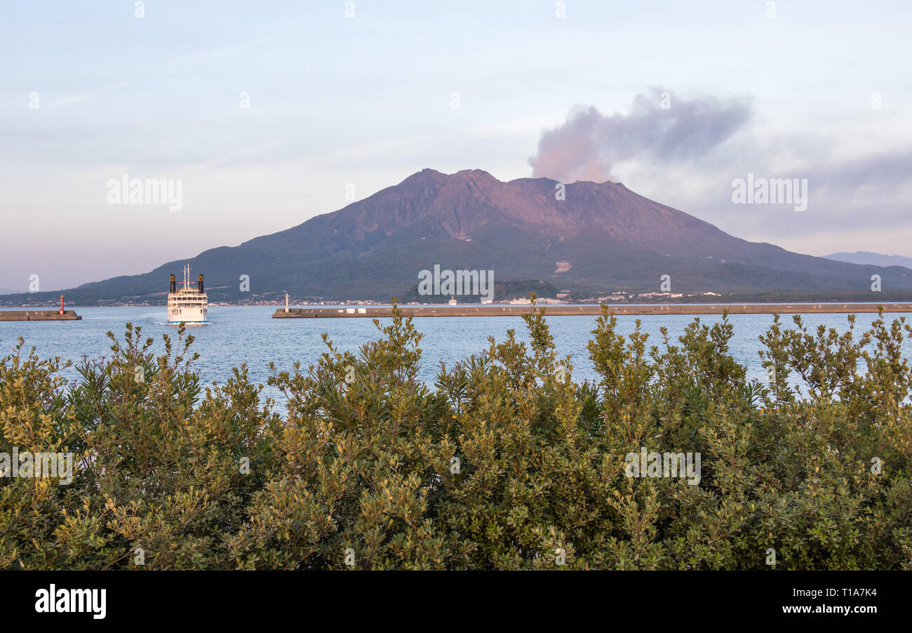 Eruption of the Vulcan Sakurajima and Kagoshima Ferry arriving the Port ...