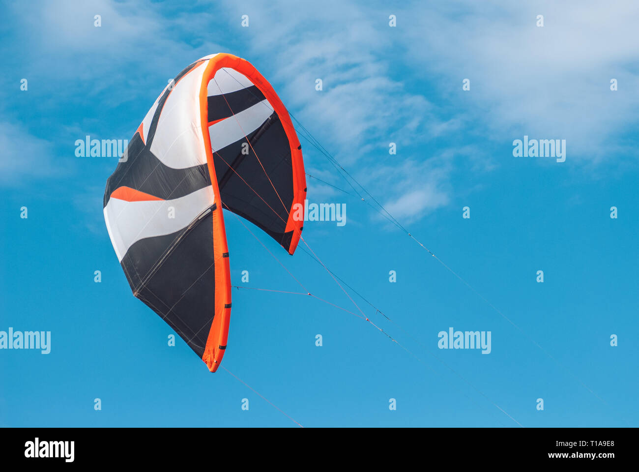 colorful sail from kitesurfing on a background of blue sky Stock Photo ...