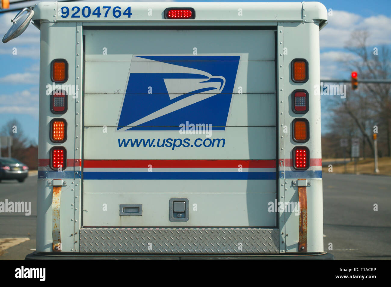 Us postal worker van hi-res stock photography and images - Alamy
