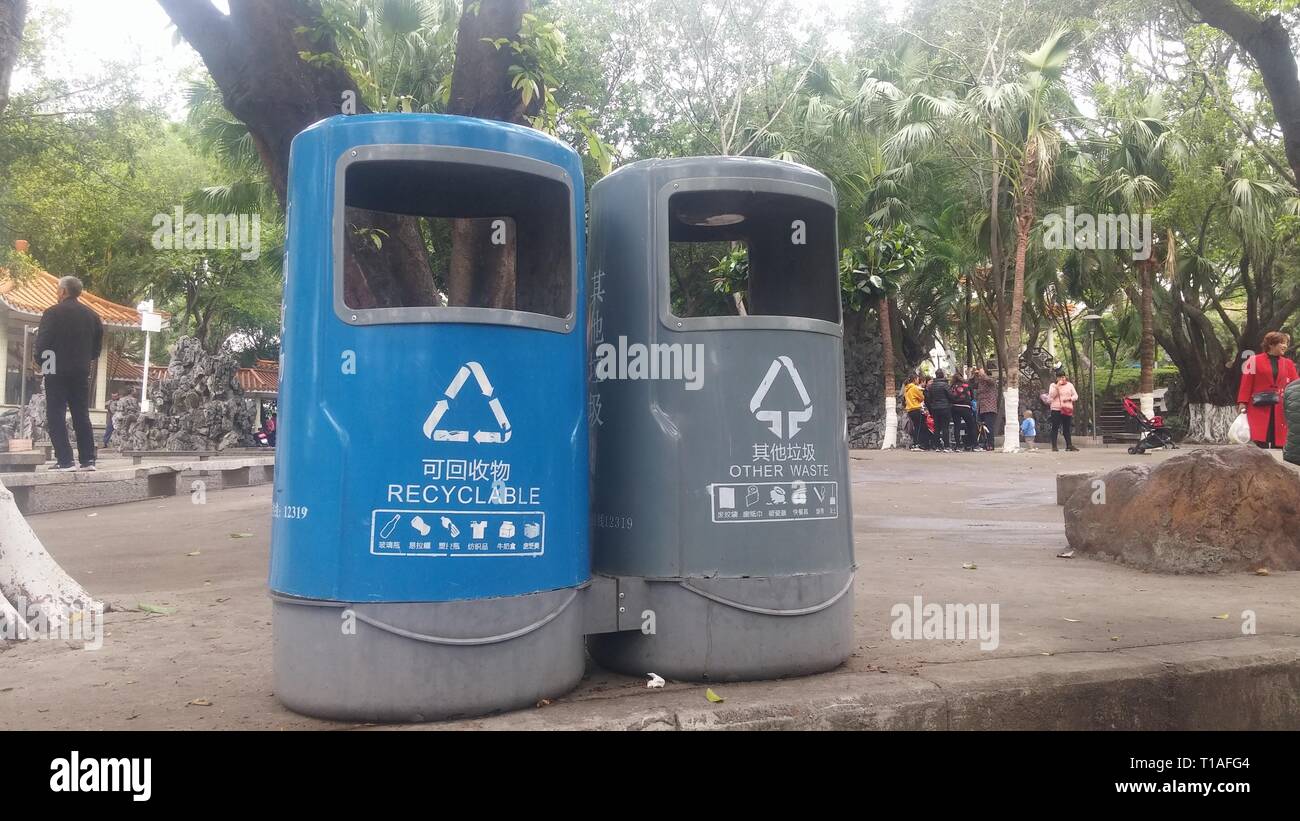 Garbage sorting bins are placed in streets or parks to facilitate ...
