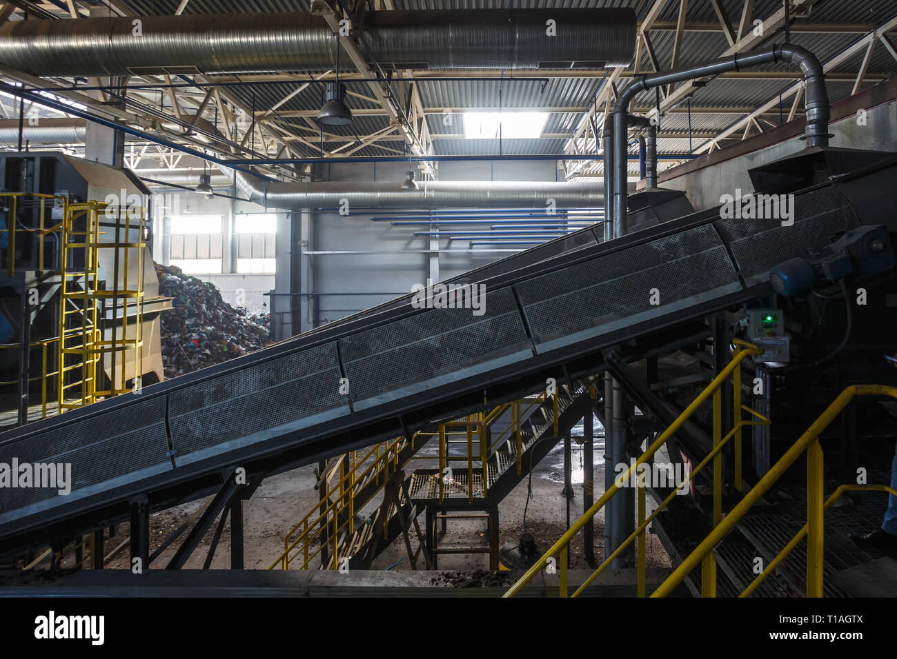 moving conveyor transporter on Modern waste recycling processing plant ...