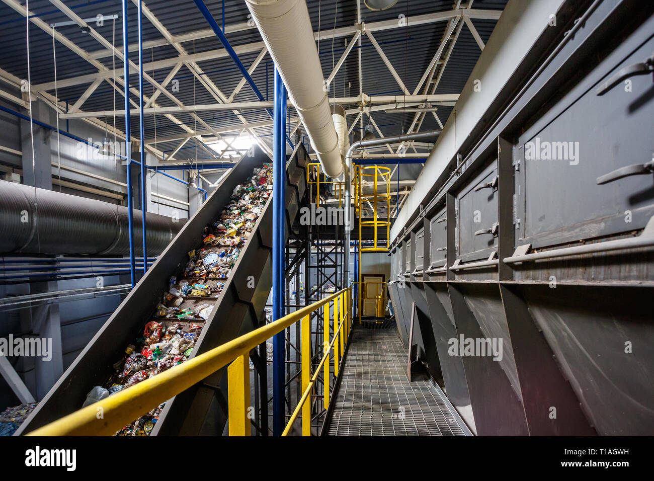 moving conveyor transporter on Modern waste recycling processing plant ...