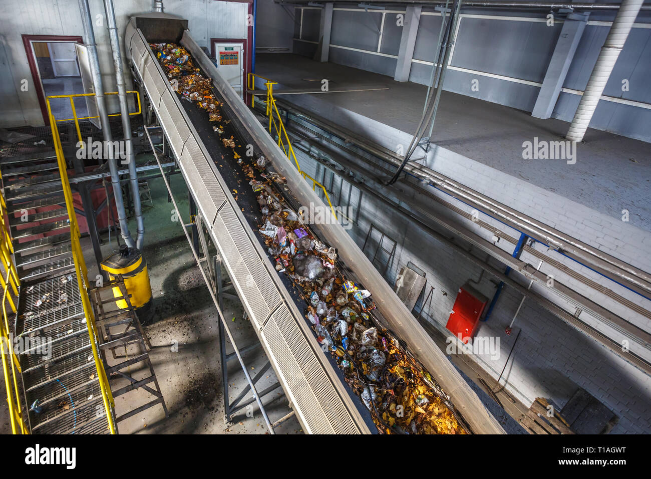 moving conveyor transporter on Modern waste recycling processing plant ...