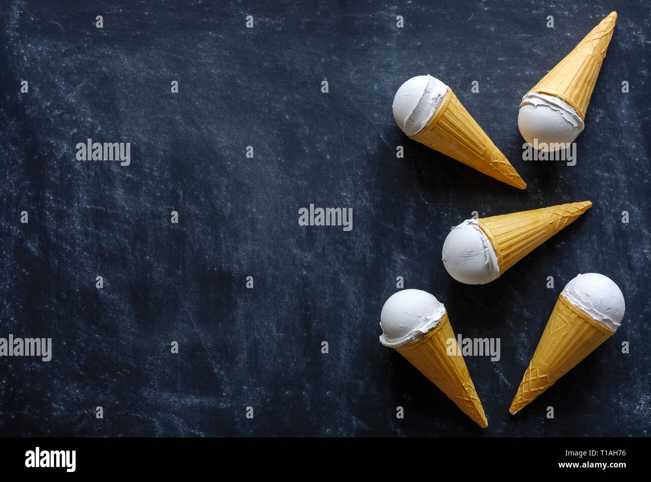 Five cones with creamy Italian ice cream dessert arranged as a side ...