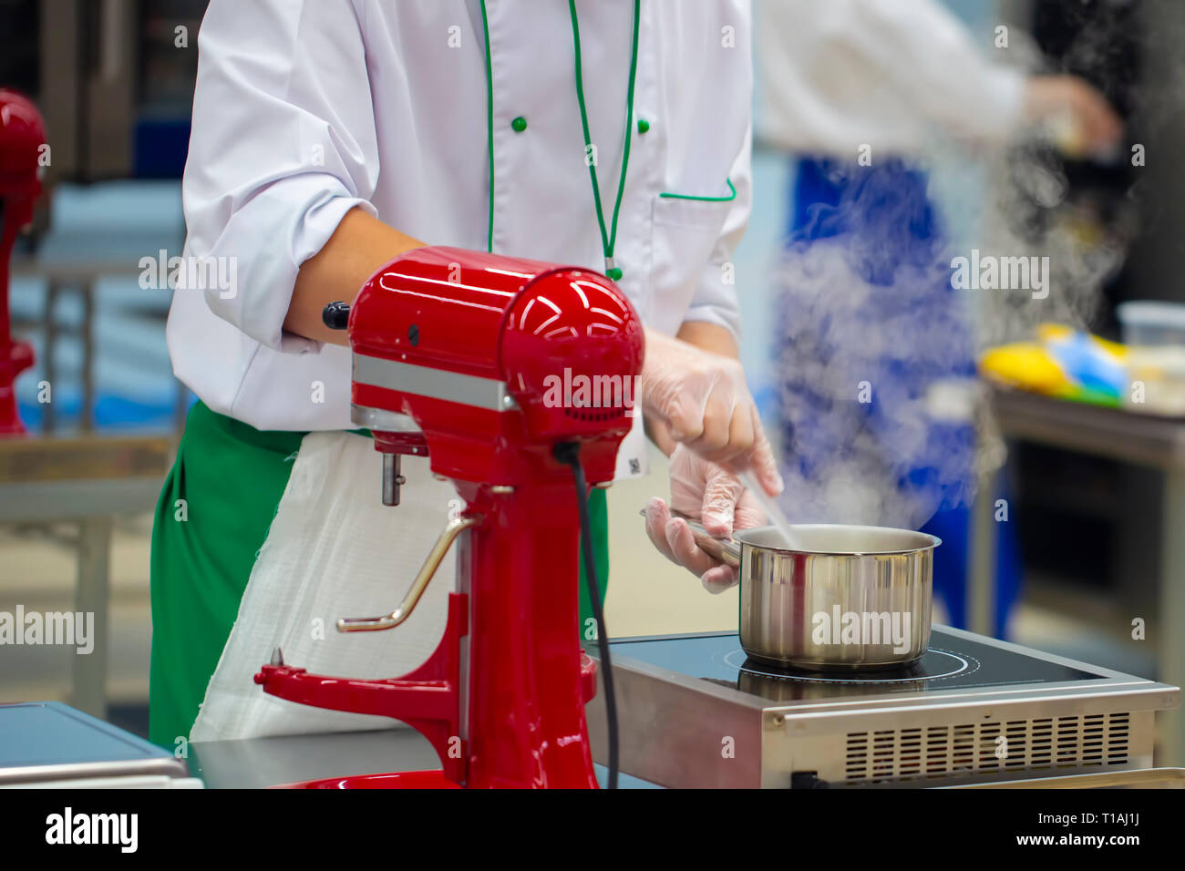 Cook over steam hi-res stock photography and images - Alamy