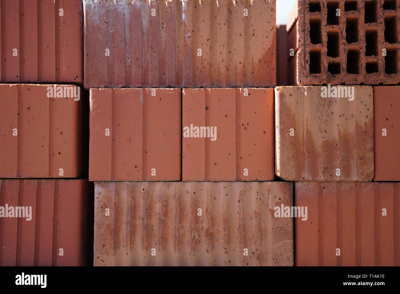 Stone building material stacked on a pallet Stock Photo - Alamy