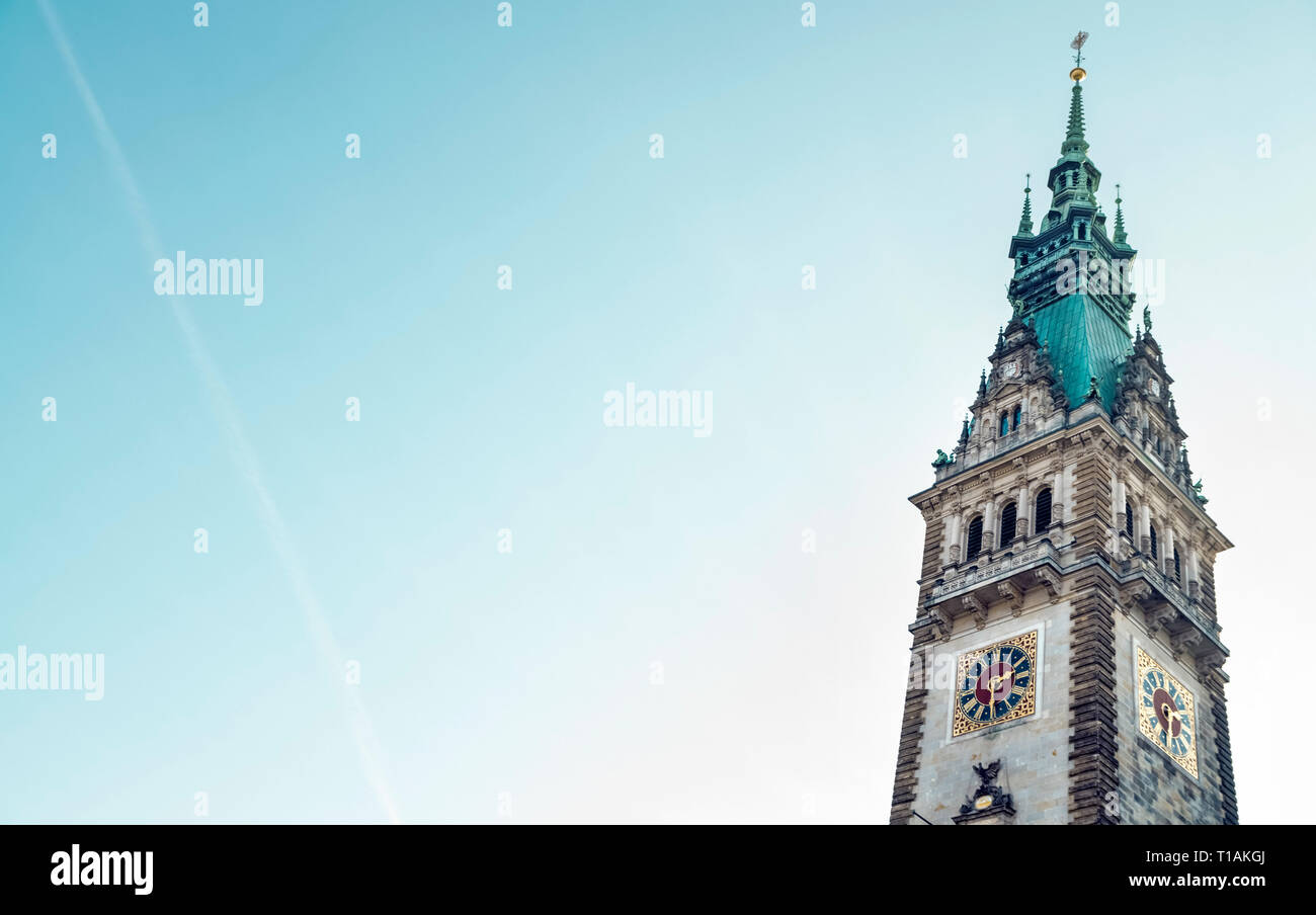 Hamburg City Hall clock tower and clear sky background Stock Photo - Alamy
