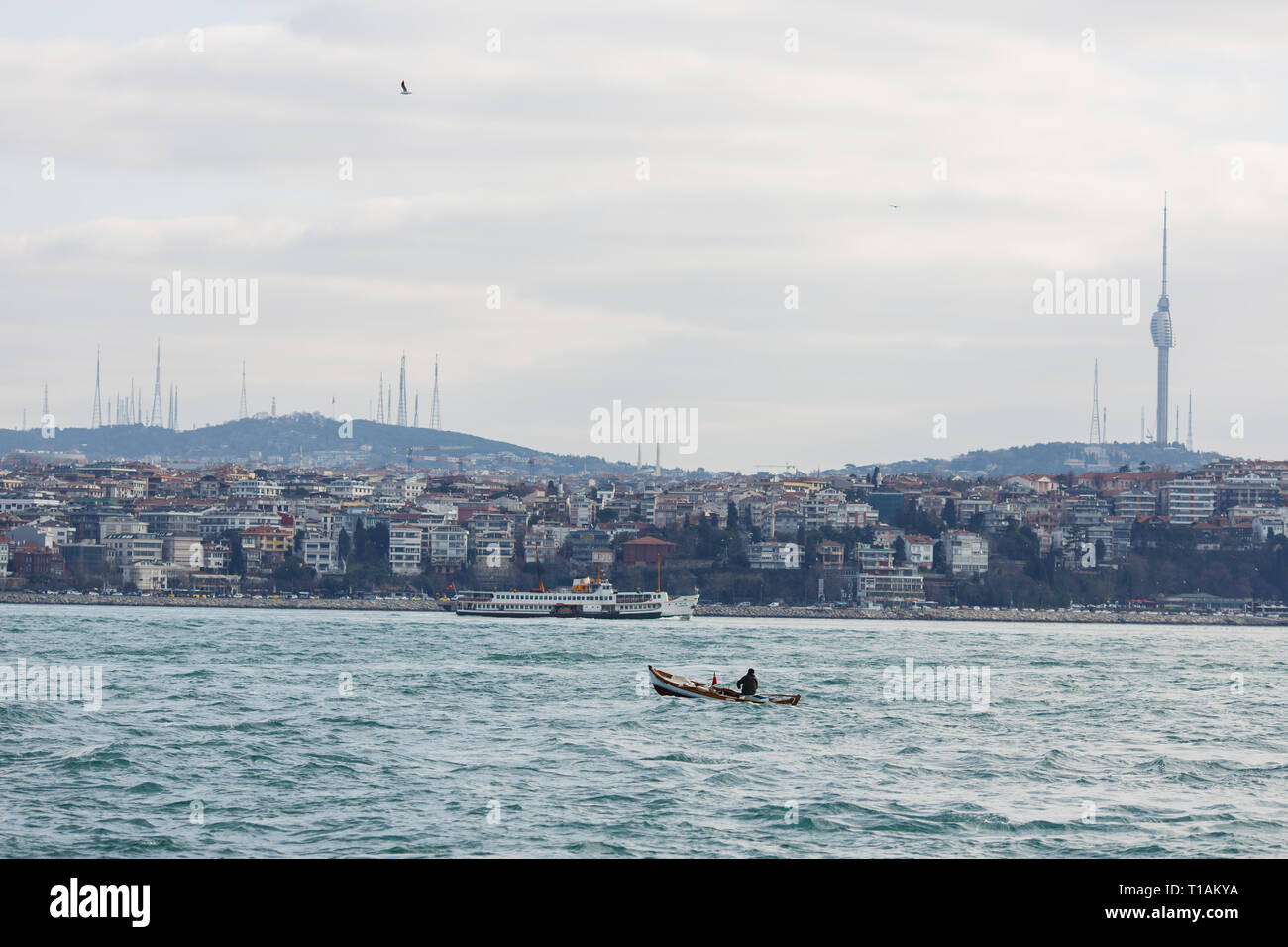 Photo of blue sea, buildings in coastal area Stock Photo - Alamy