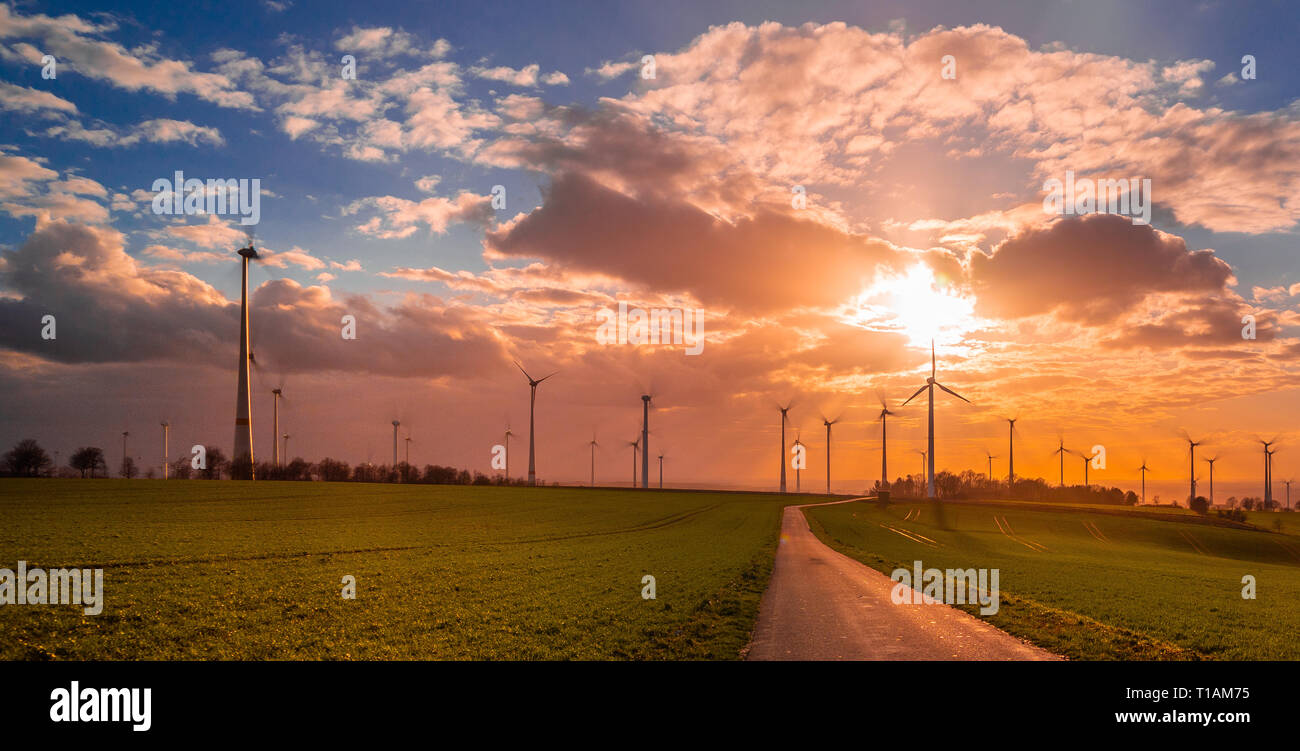 Sunset with wind turbines hi-res stock photography and images - Alamy