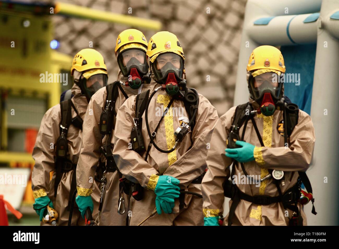 Hong Kong. 25th Mar, 2019. Firefighters awaiting for their turn to ...