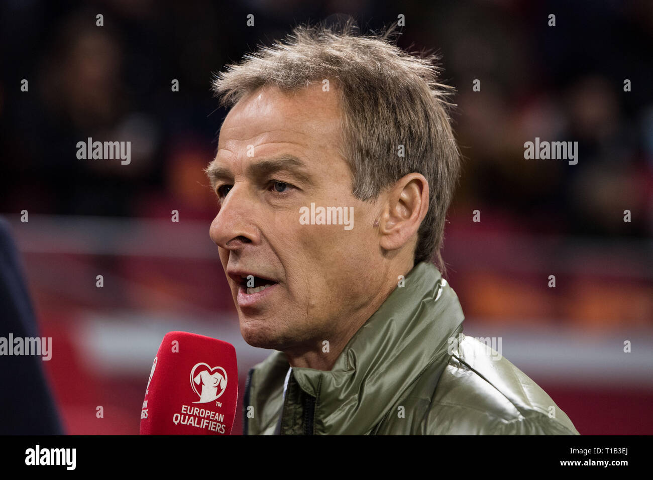 Juergen KLINSMANN (Young, TV-football expert) with Microphone, Micro ...