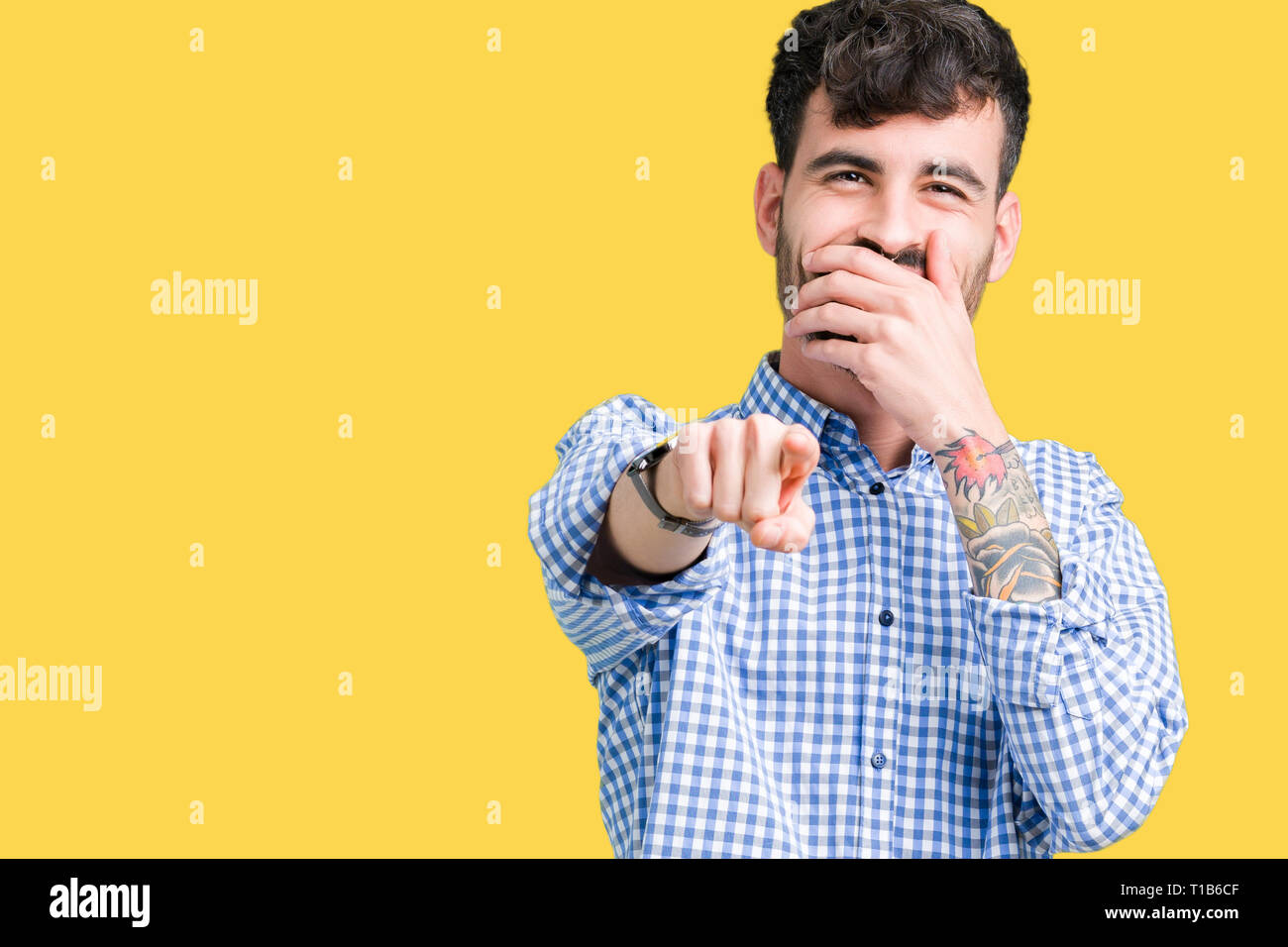 Man hand over mouth laughing hi-res stock photography and images - Alamy