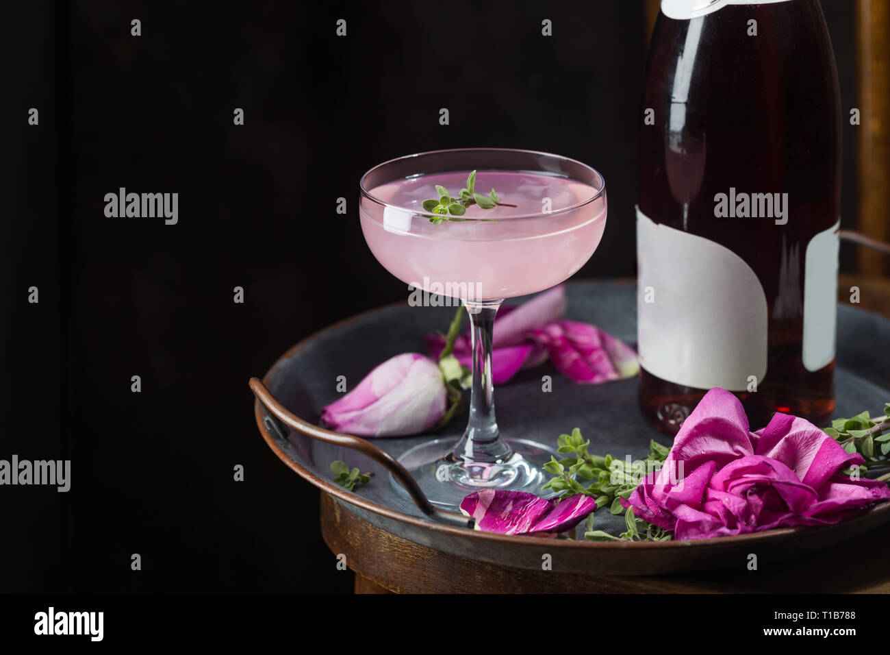 Summer refreshment drinks. Light pink rose cocktail, with rose wine on ...