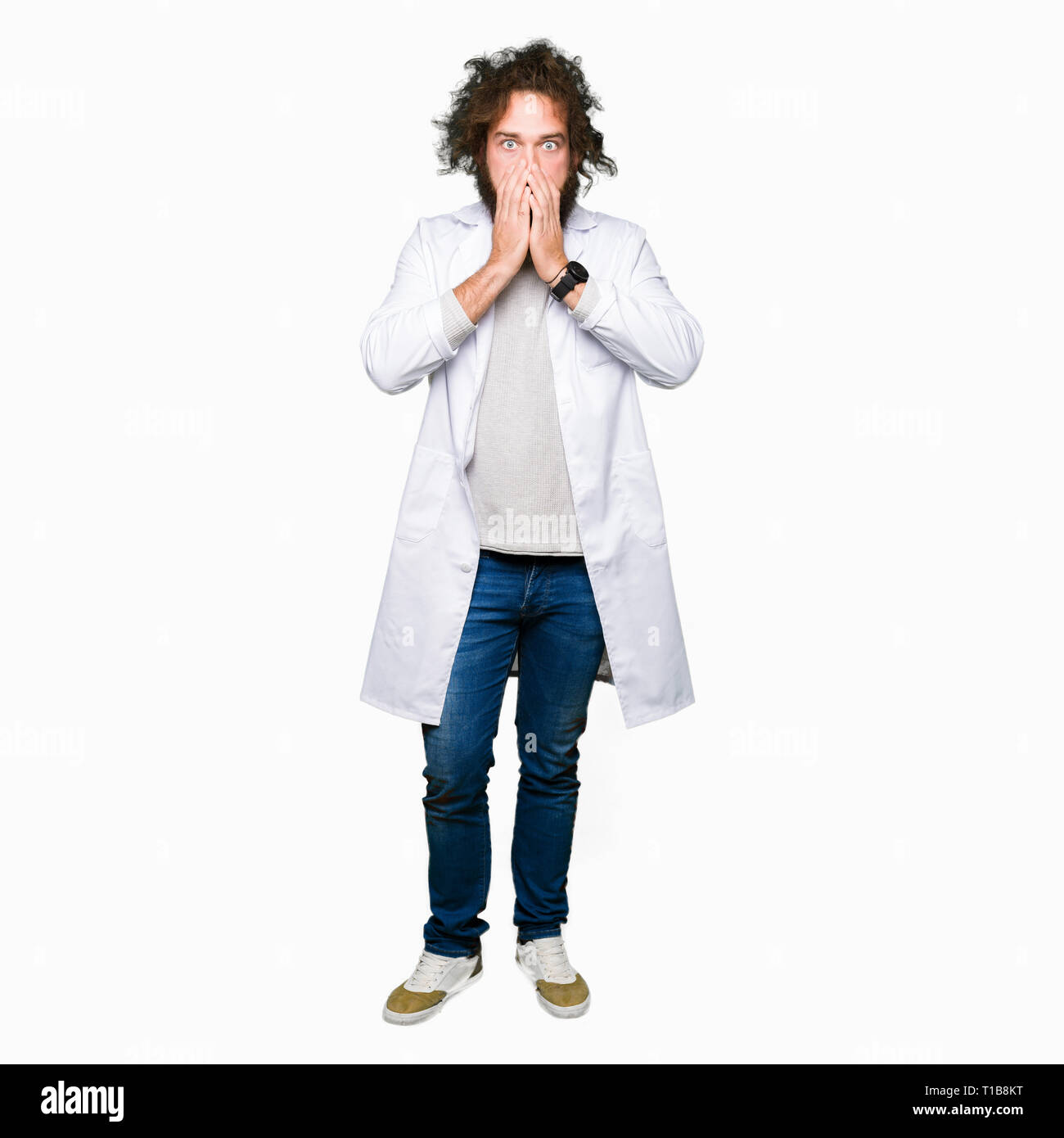 Crazy scientist with funny long hair shocked covering mouth with hands ...