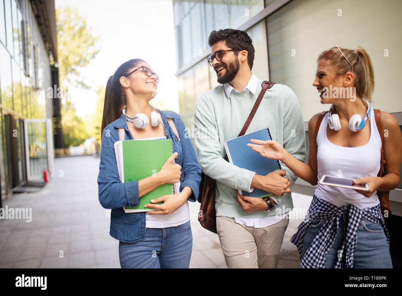 Group of friends studying together at university campus Stock Photo - Alamy