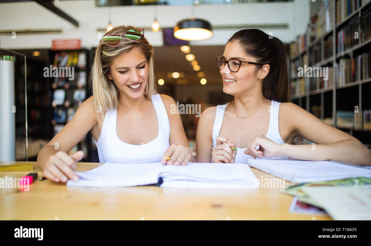 Group of friends studying together at university campus Stock Photo - Alamy