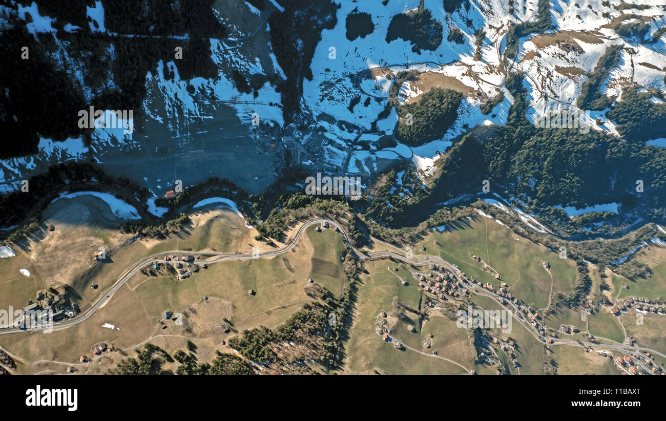 stunning Aerial top down views of a alpine river valley winding though ...