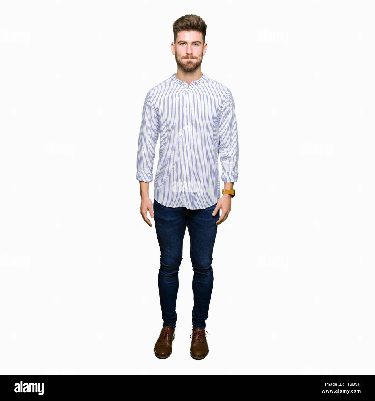 Young handsome man puffing cheeks with funny face. Mouth inflated with ...