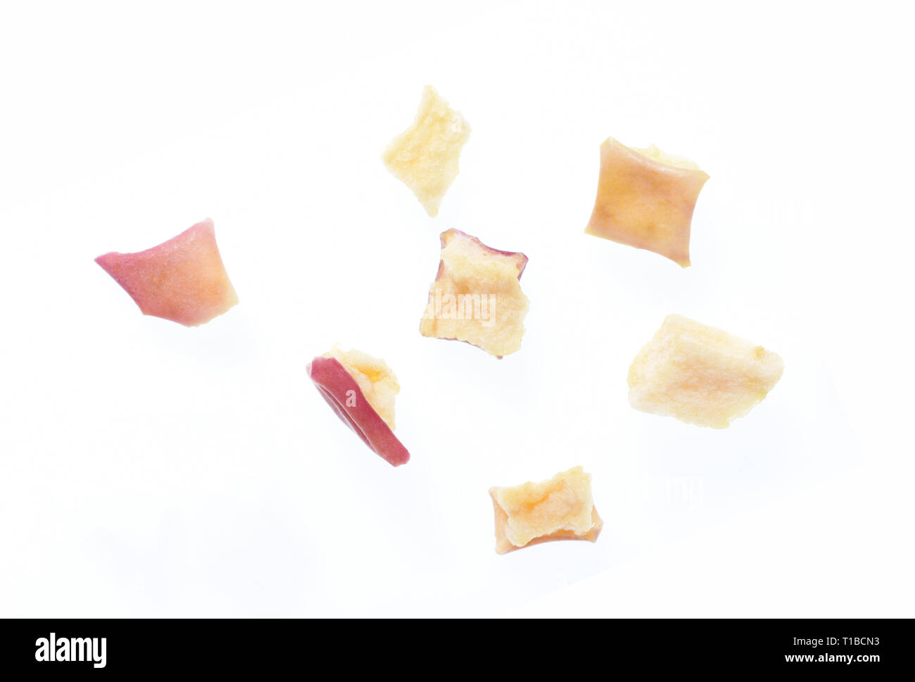 Close up photo image of cube sliced dry red apple isolated on white ...