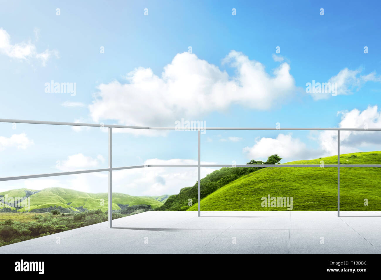 Terrace of building with iron fence and green landscapes view with blue ...
