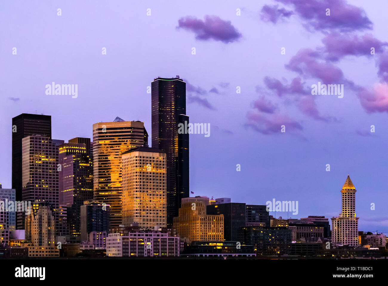 Seattle skyline at dusk, after sunset, from Elliott Bay, with copy ...