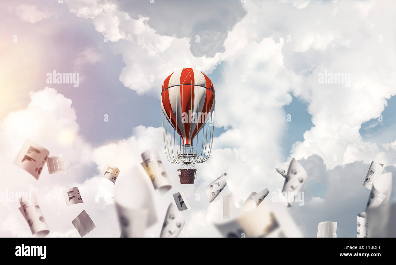 Flying hot air balloon in the air Stock Photo - Alamy