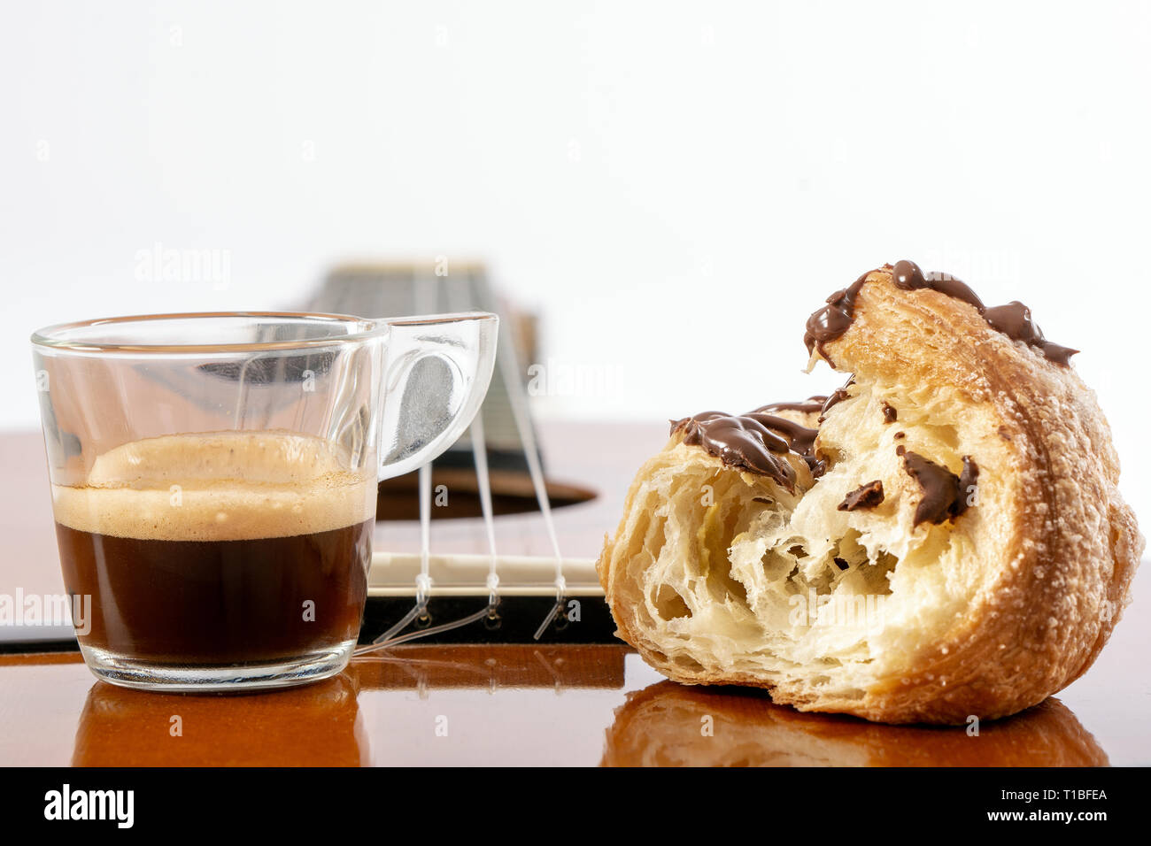 Coffee, brioche and music; the artist's breakfast Stock Photo - Alamy