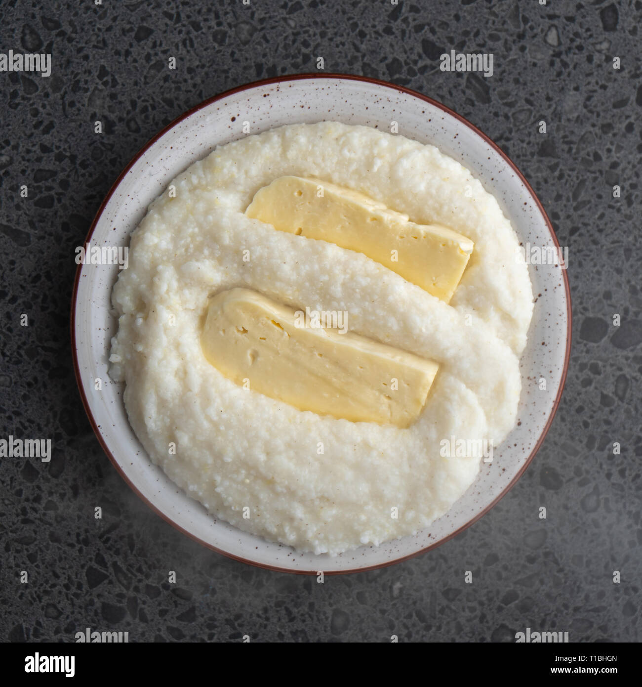 Mengrelian corn mamalica (ghomi) with cheese. Georgian traditional food ...