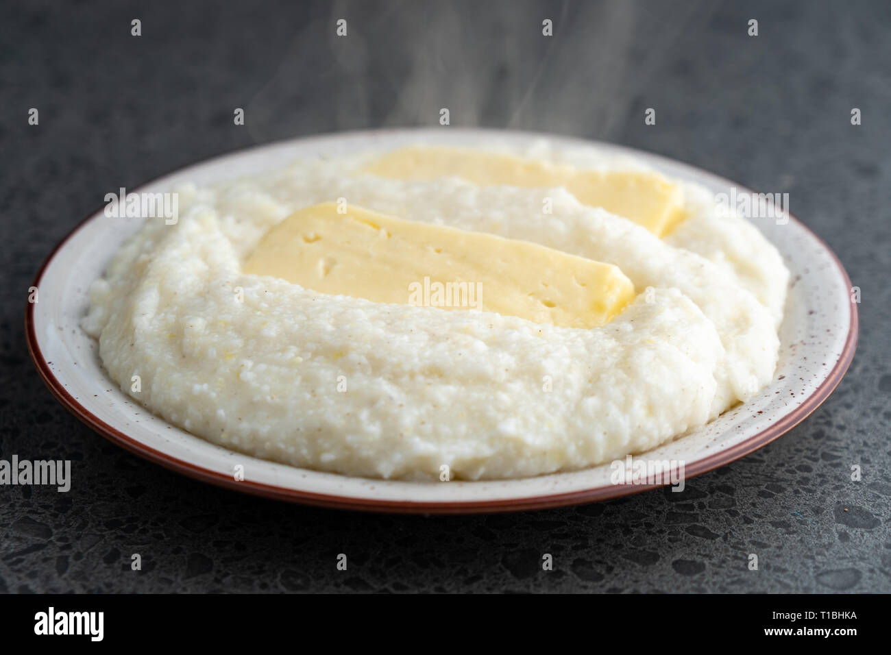 Mengrelian corn mamalica (ghomi) with cheese. Georgian traditional food ...