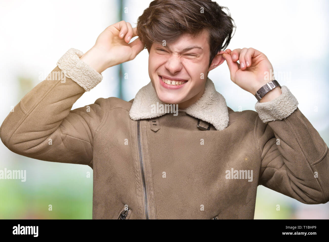 Boy pulling boy ear hi-res stock photography and images - Alamy