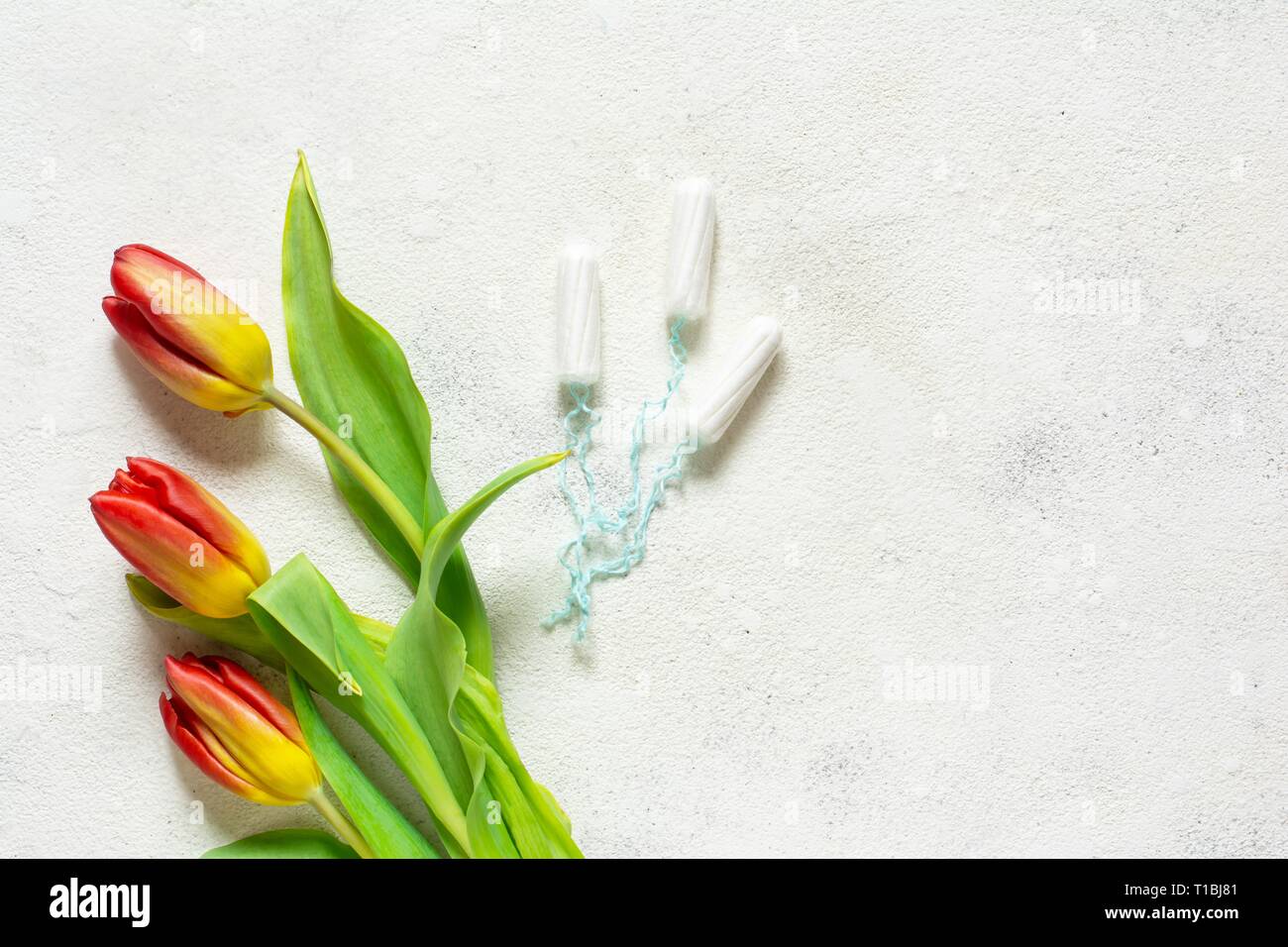 Cotton tampons on a gray and white background. Top view, flat lay ...
