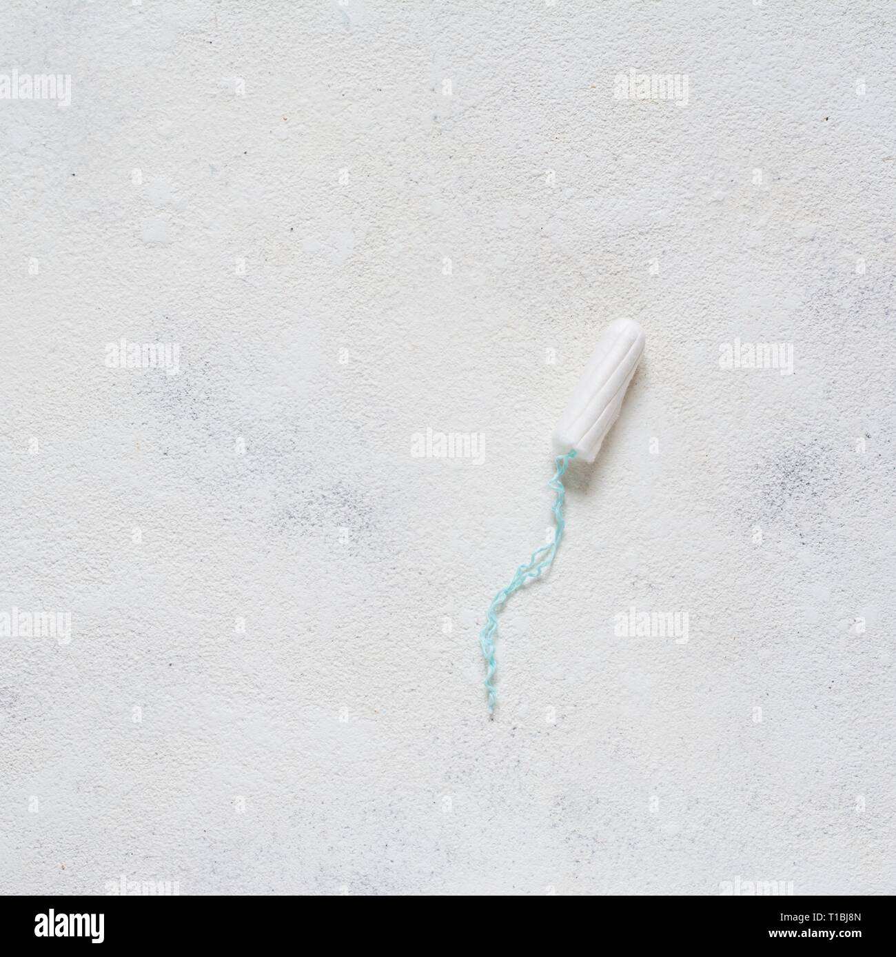 Cotton tampons on a gray and white background. Top view, flat lay ...