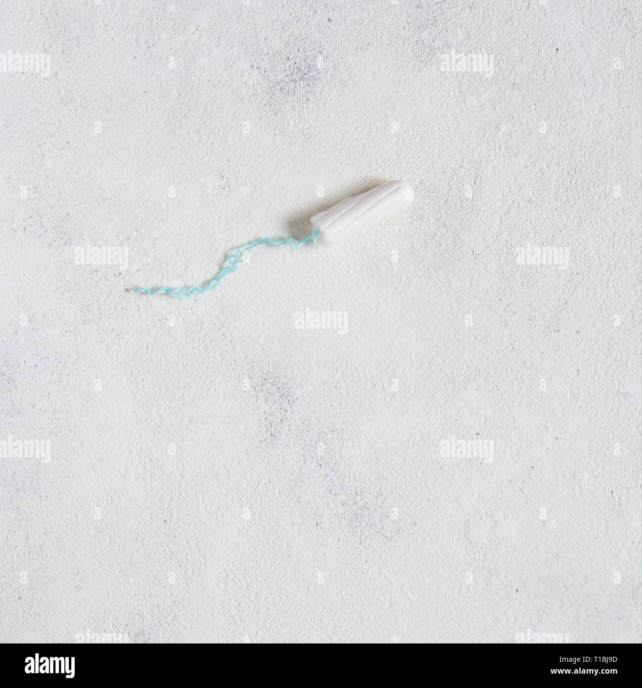 Cotton tampons on a gray and white background. Top view, flat lay ...