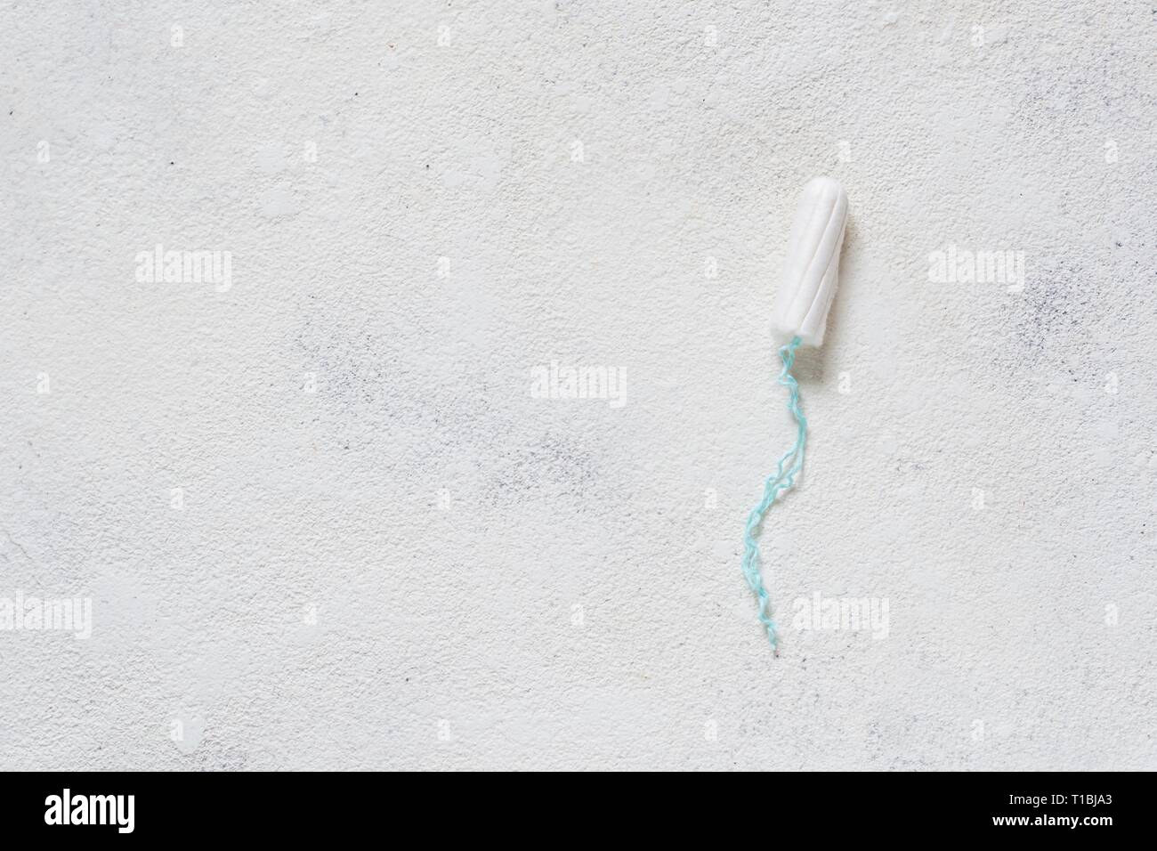 Cotton tampons on a gray and white background. Top view, flat lay ...