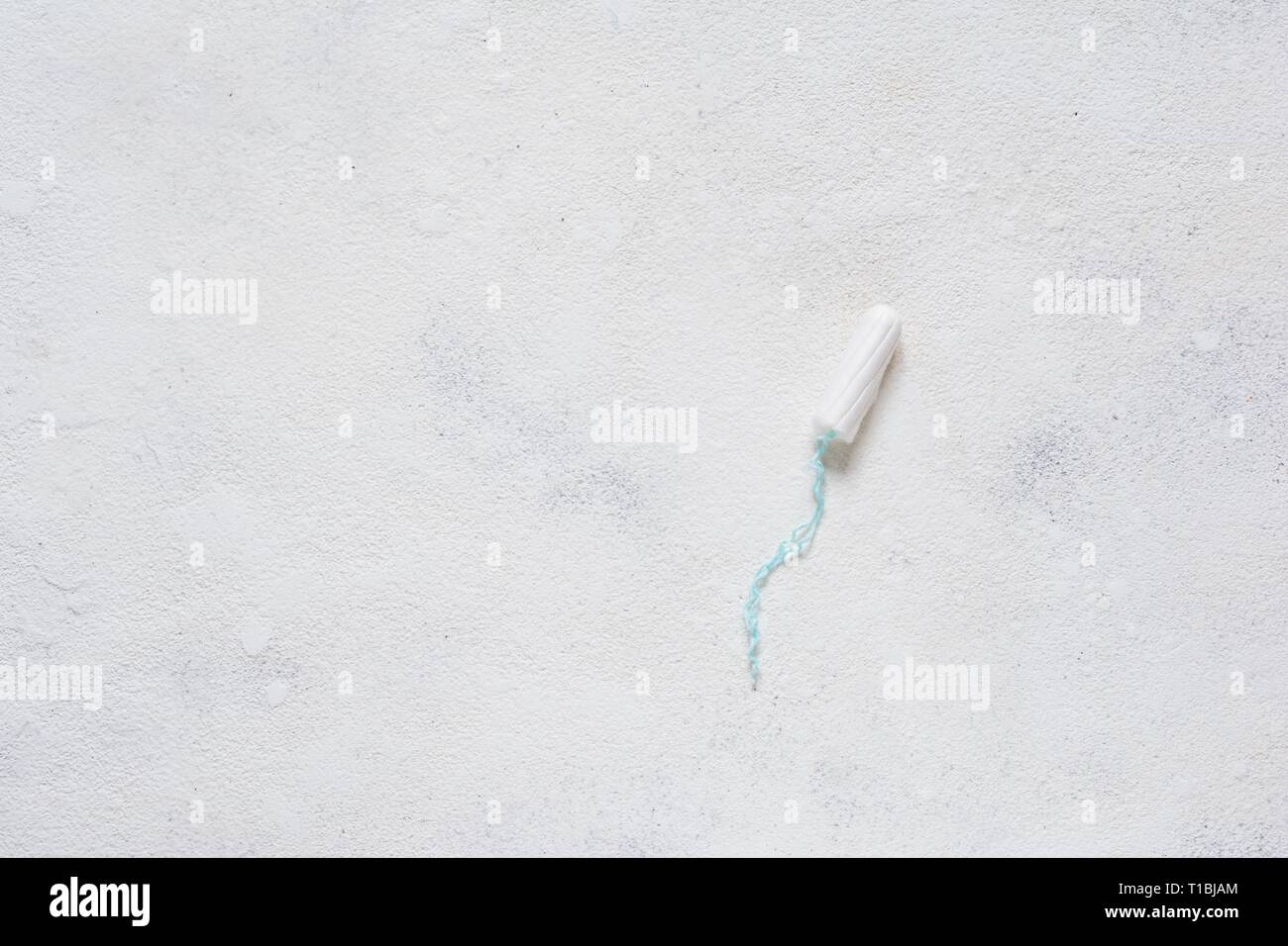 Cotton tampons on a gray and white background. Top view, flat lay ...