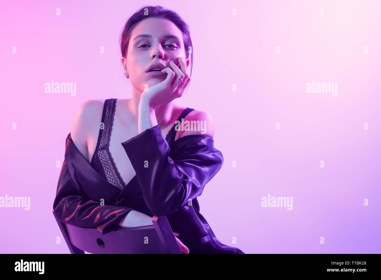 Cinematic night portrait of woman in neon. High Fashion model girl in ...