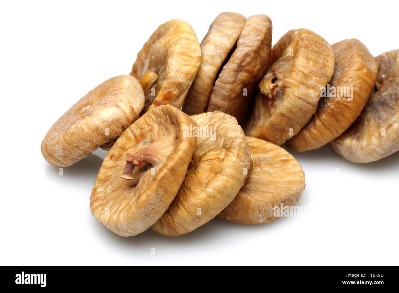 Dried figs isolated on white background Stock Photo - Alamy