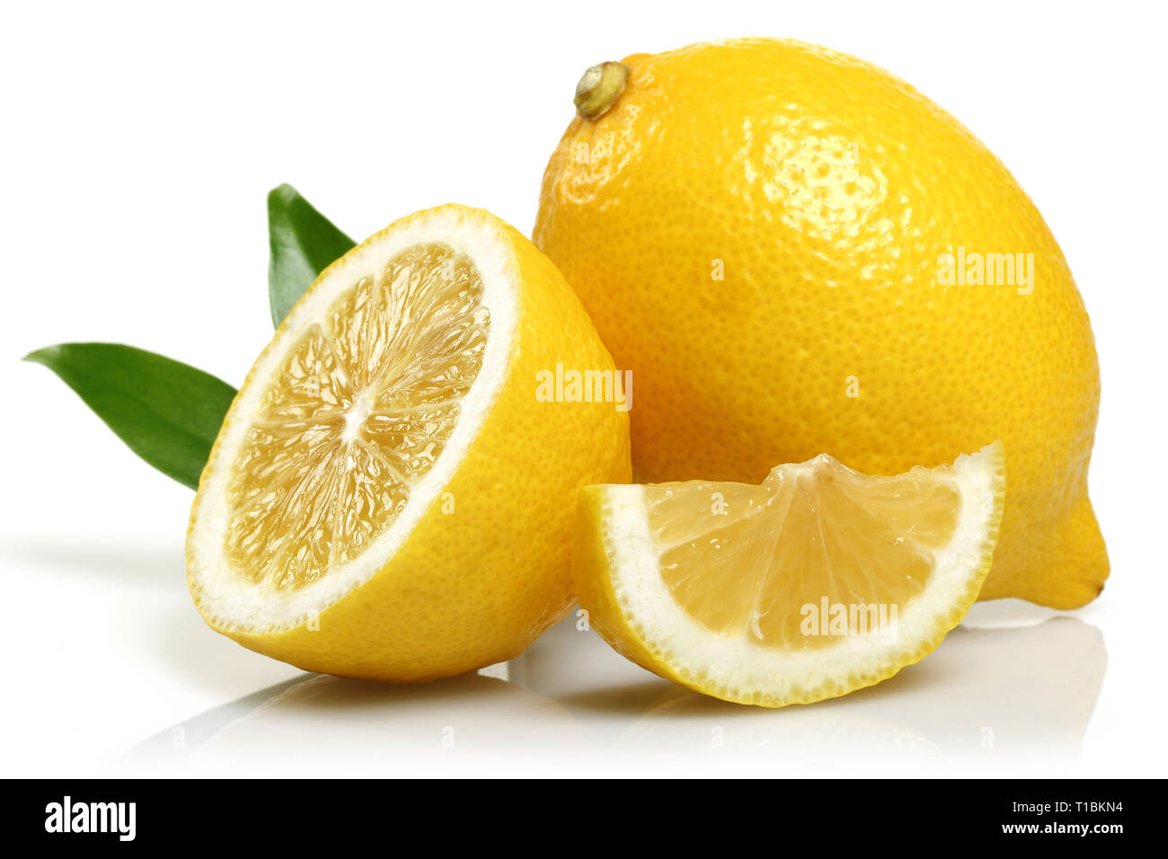 Fresh lemon fruits with leaves isolated on white background Stock Photo ...
