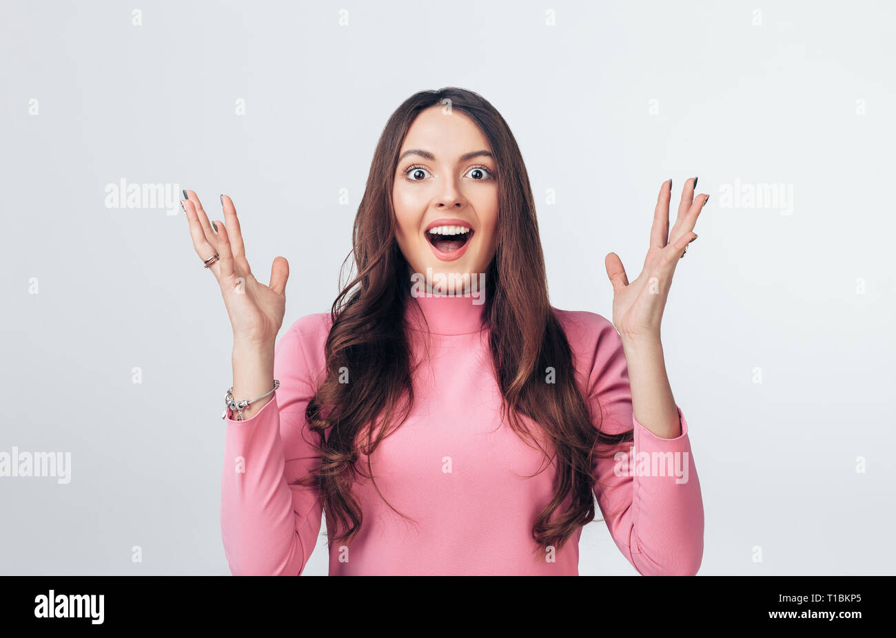 Surprised woman arms up isolated hi-res stock photography and images ...