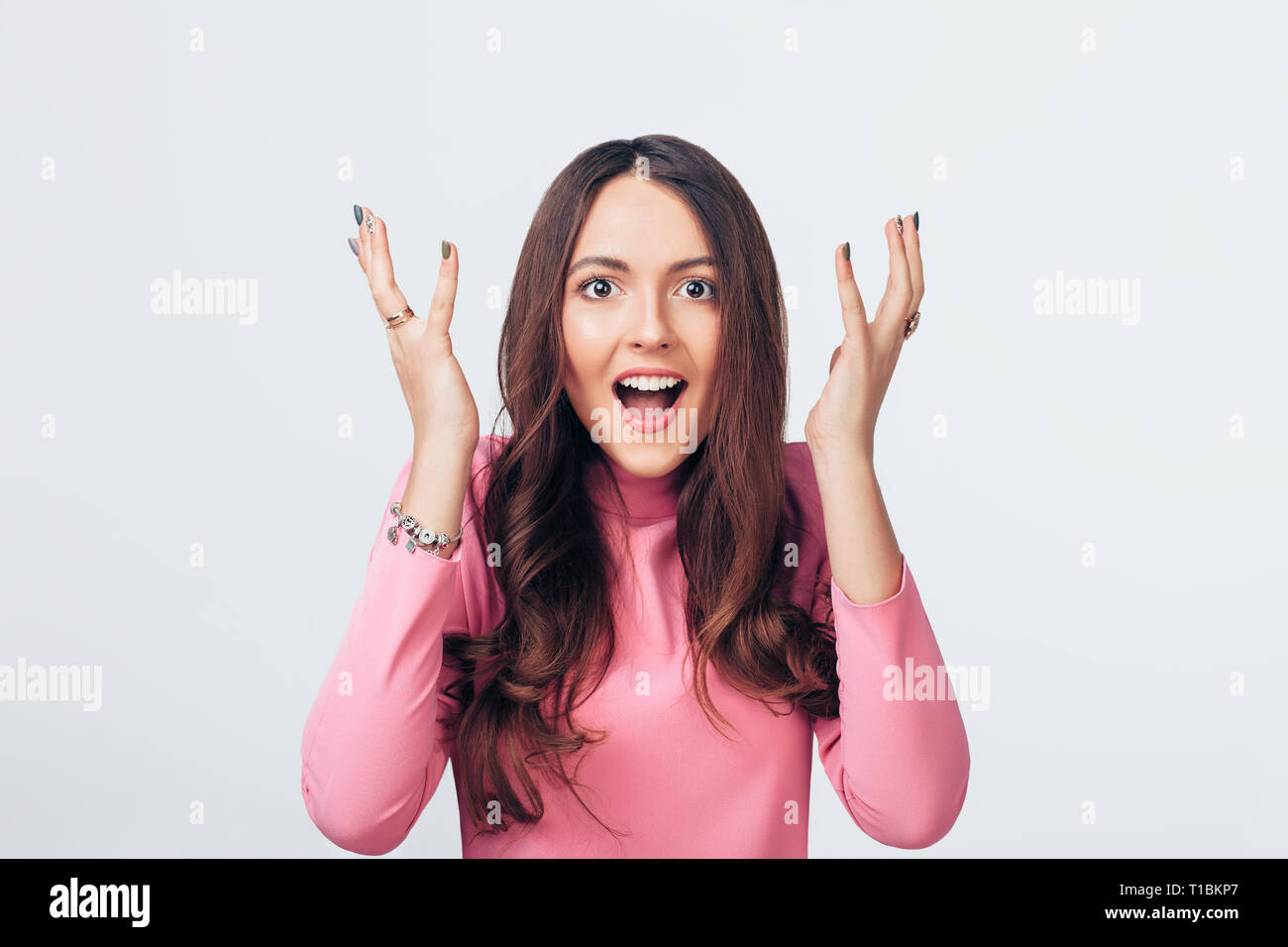 Surprised woman arms up isolated hi-res stock photography and images ...