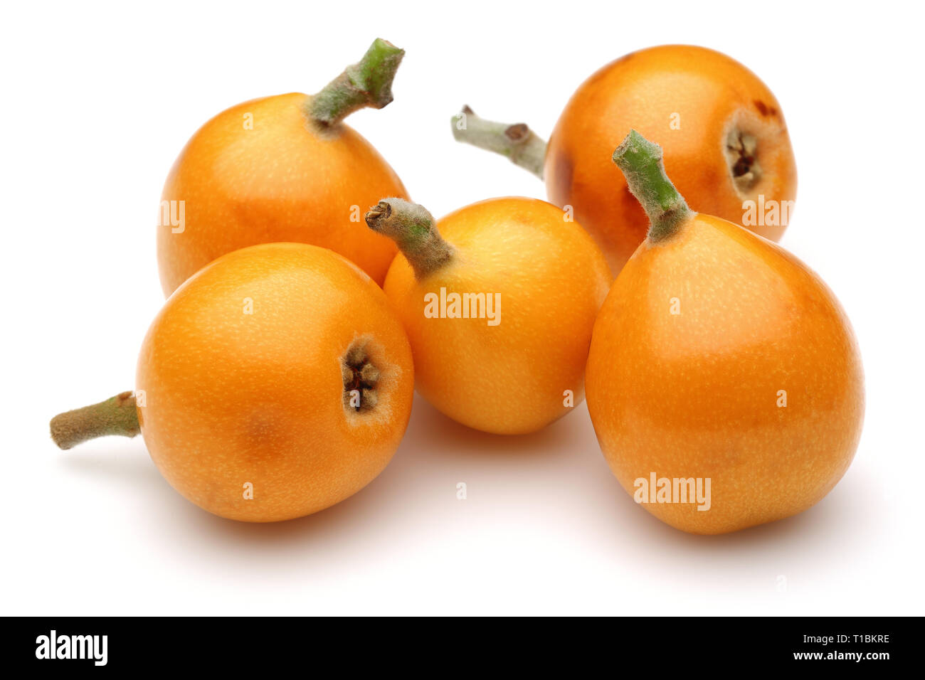 Ripe loquat fruits isolated on white background Stock Photo - Alamy