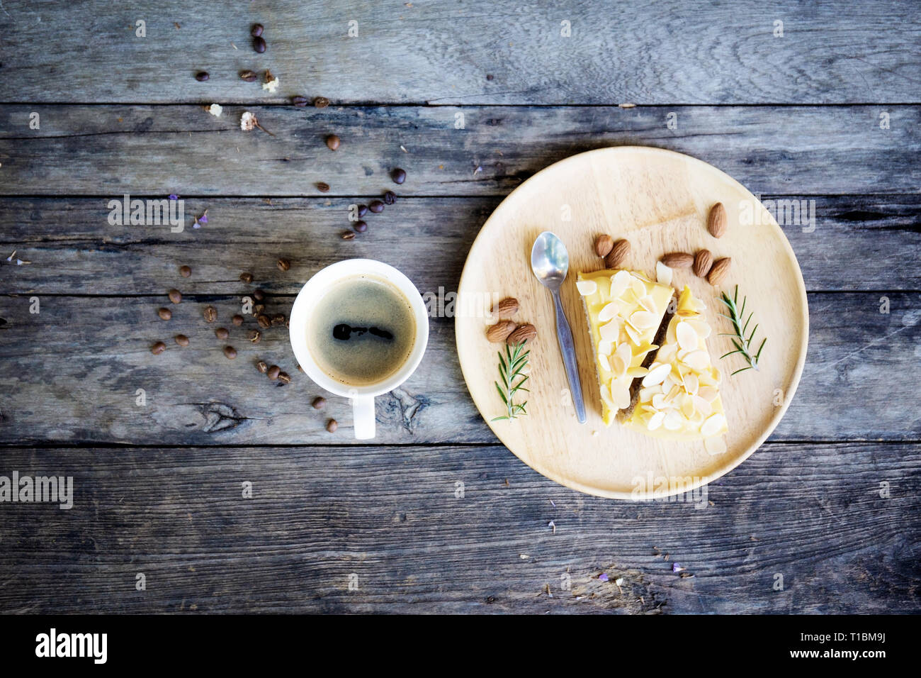 Coffee cup and cake on table with top view background Stock Photo - Alamy