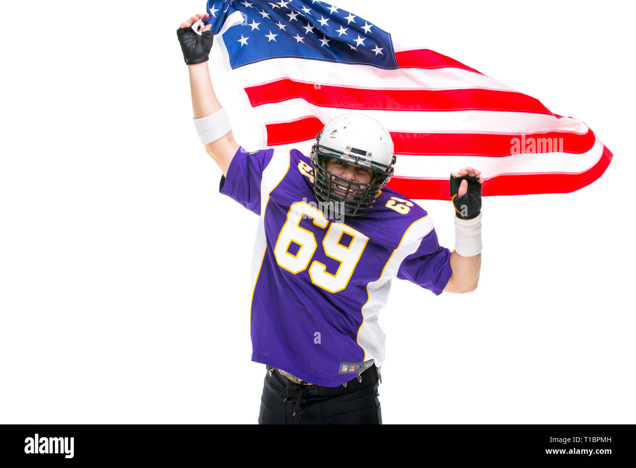 Soccer player in uniform waving american flag Stock Photo - Alamy