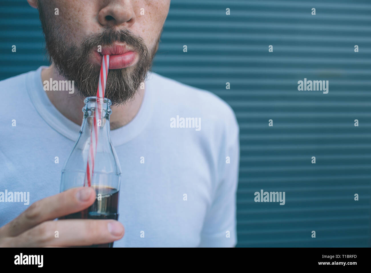 Man drinking coca cola hi-res stock photography and images - Alamy